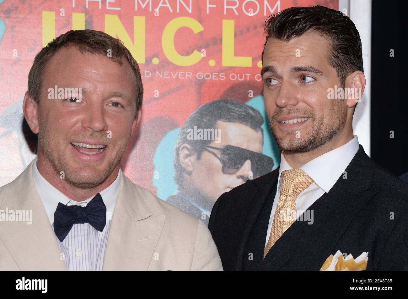 (L-R) Director Guy Ritchie and actor Henry Cavill attend "The Man From ...