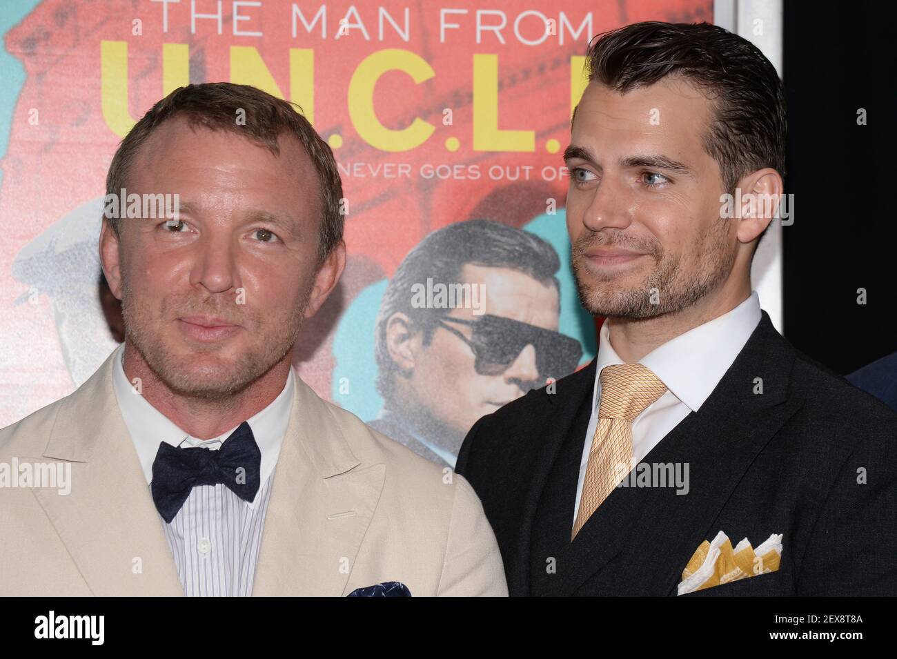 (L-R) Director Guy Ritchie and actor Henry Cavill attend "The Man From ...