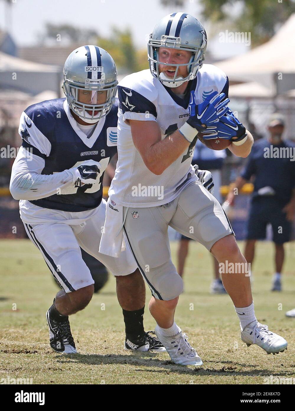 Dallas Cowboys wide receiver Cole Beasley, right, makes a cut during ...