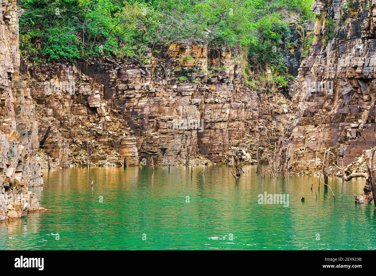 Beautiful landscape with sedimentary rock walls with golden tones and ...