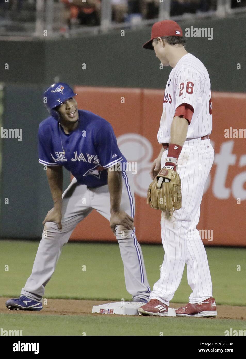 Toronto Blue Jays' Ben Revere and Philadelphia Phillies' Chase Utley ...