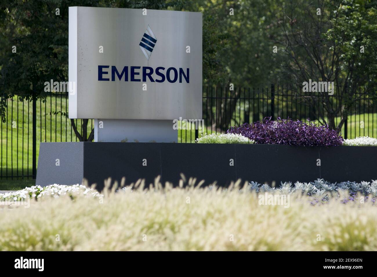 A logo sign outside of the headquarters of Emerson Electric, in ...