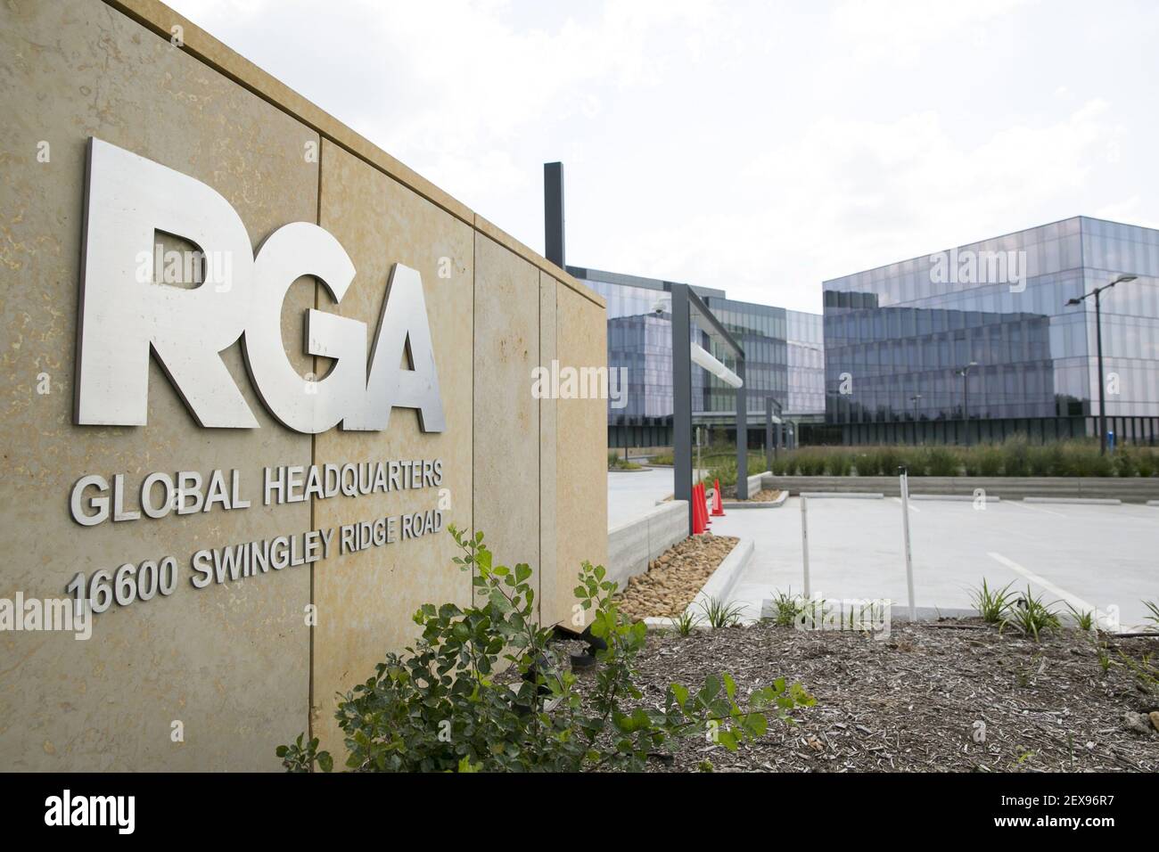 A logo sign outside of the headquarters of Reinsurance Group of America ...