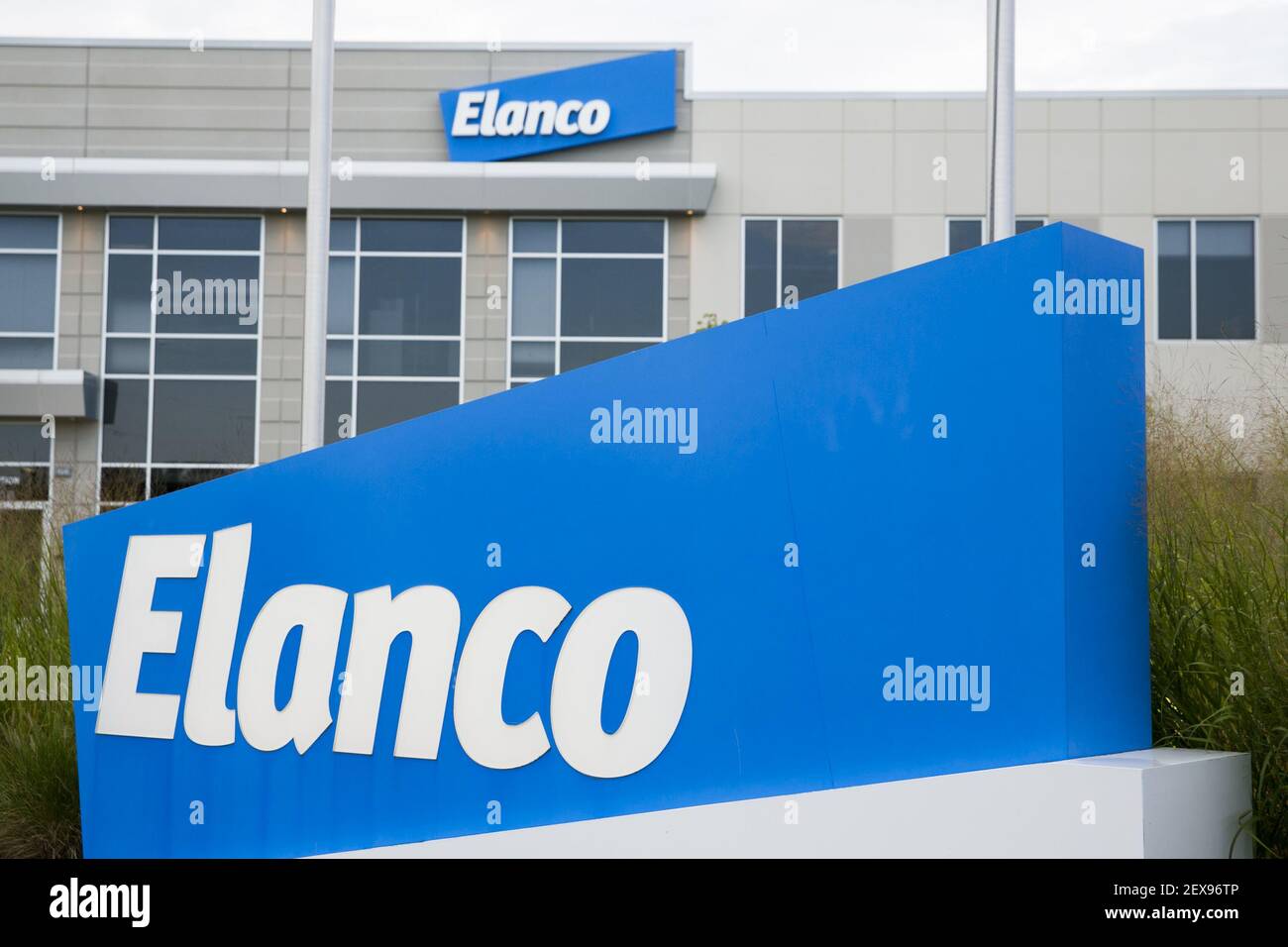 A logo sign outside of the headquarters of Elanco Animal Health, in ...
