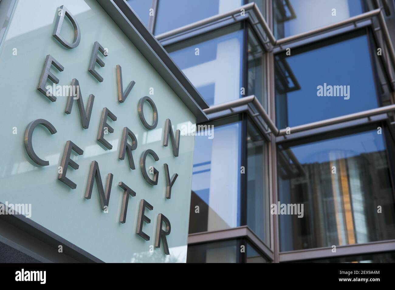 A logo sign outside of the Devon Energy Center, headquarters of the ...