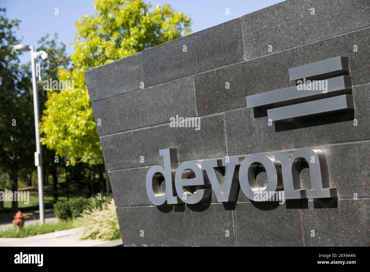 A logo sign outside of the Devon Energy Center, headquarters of the ...