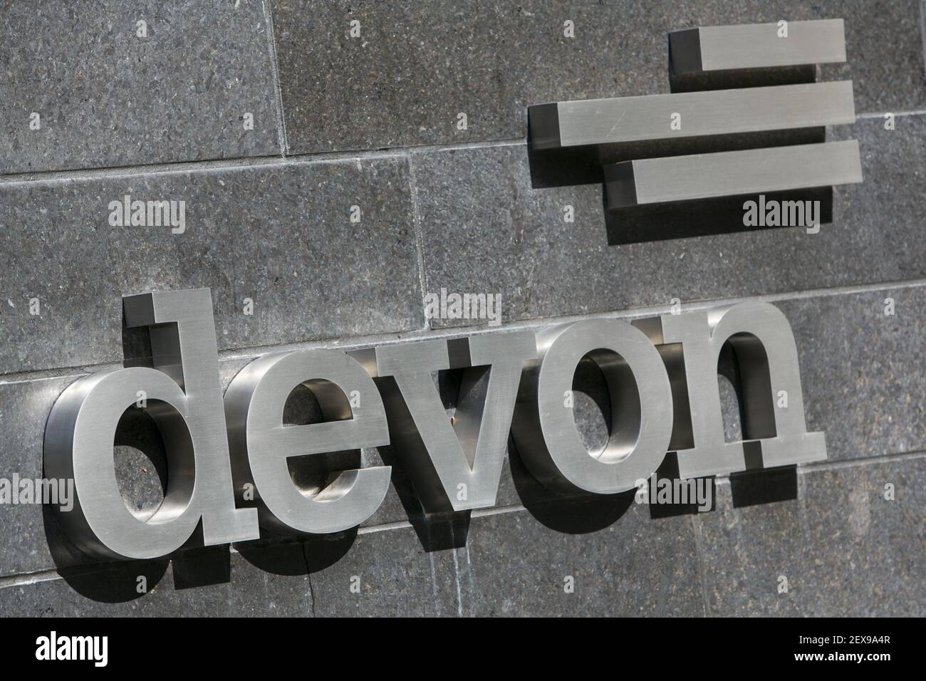 A logo sign outside of the Devon Energy Center, headquarters of the ...
