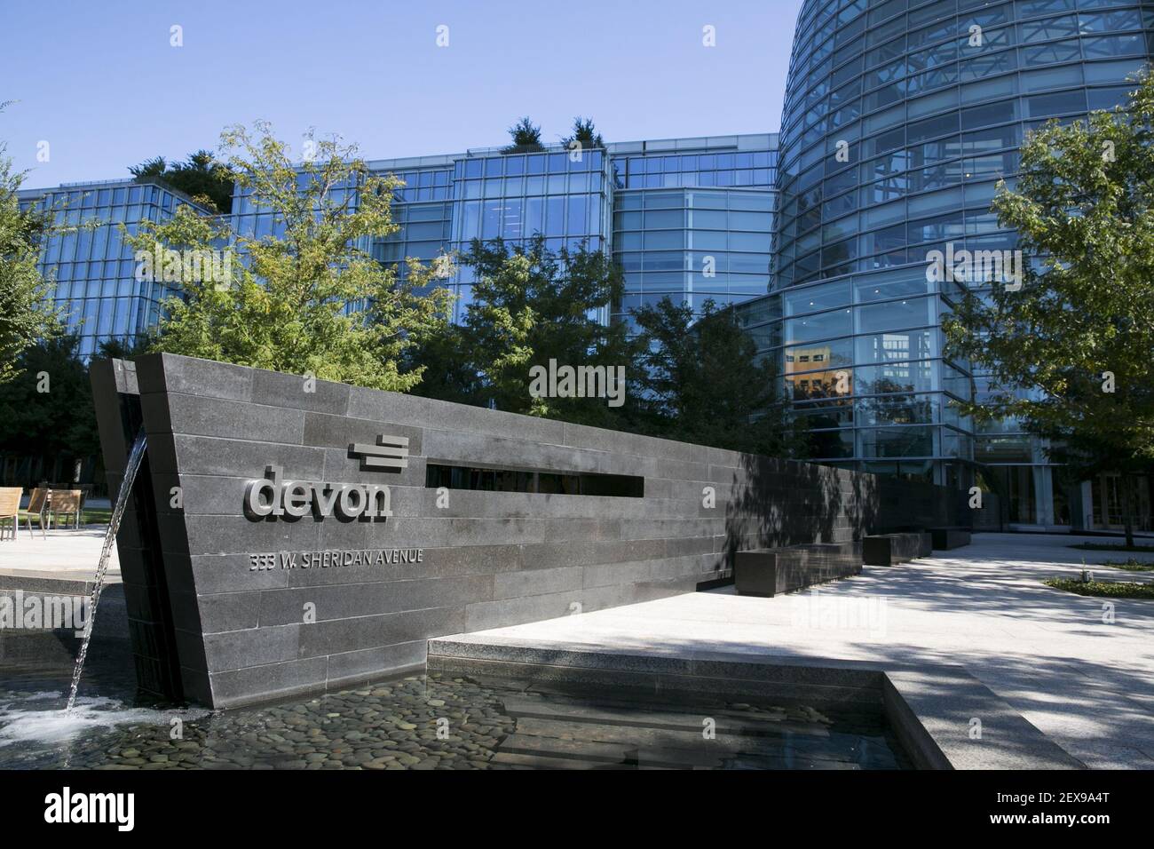 A logo sign outside of the Devon Energy Center, headquarters of the ...