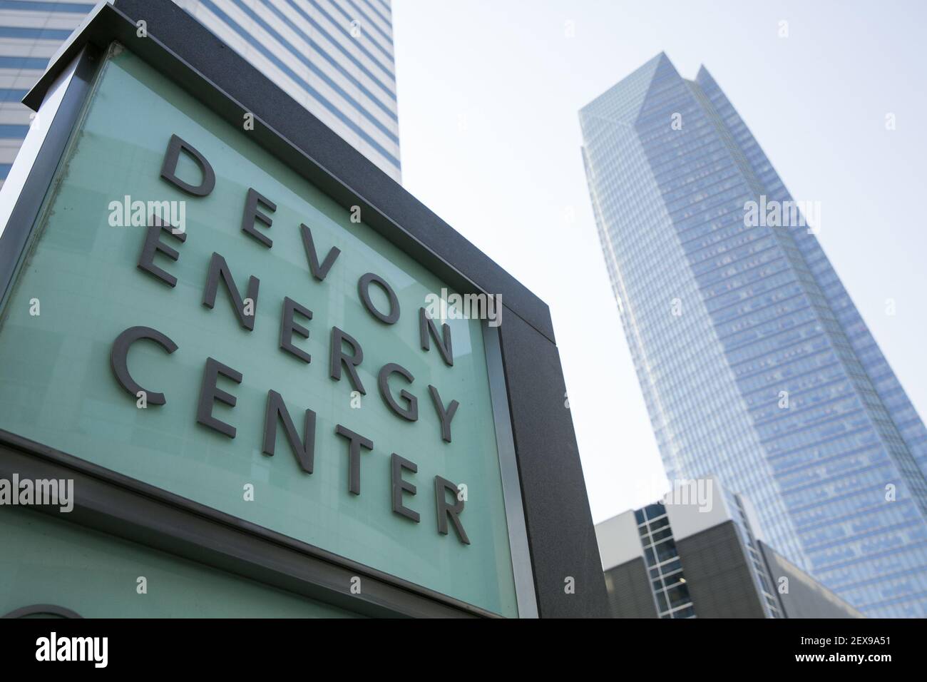 A logo sign outside of the Devon Energy Center, headquarters of the ...