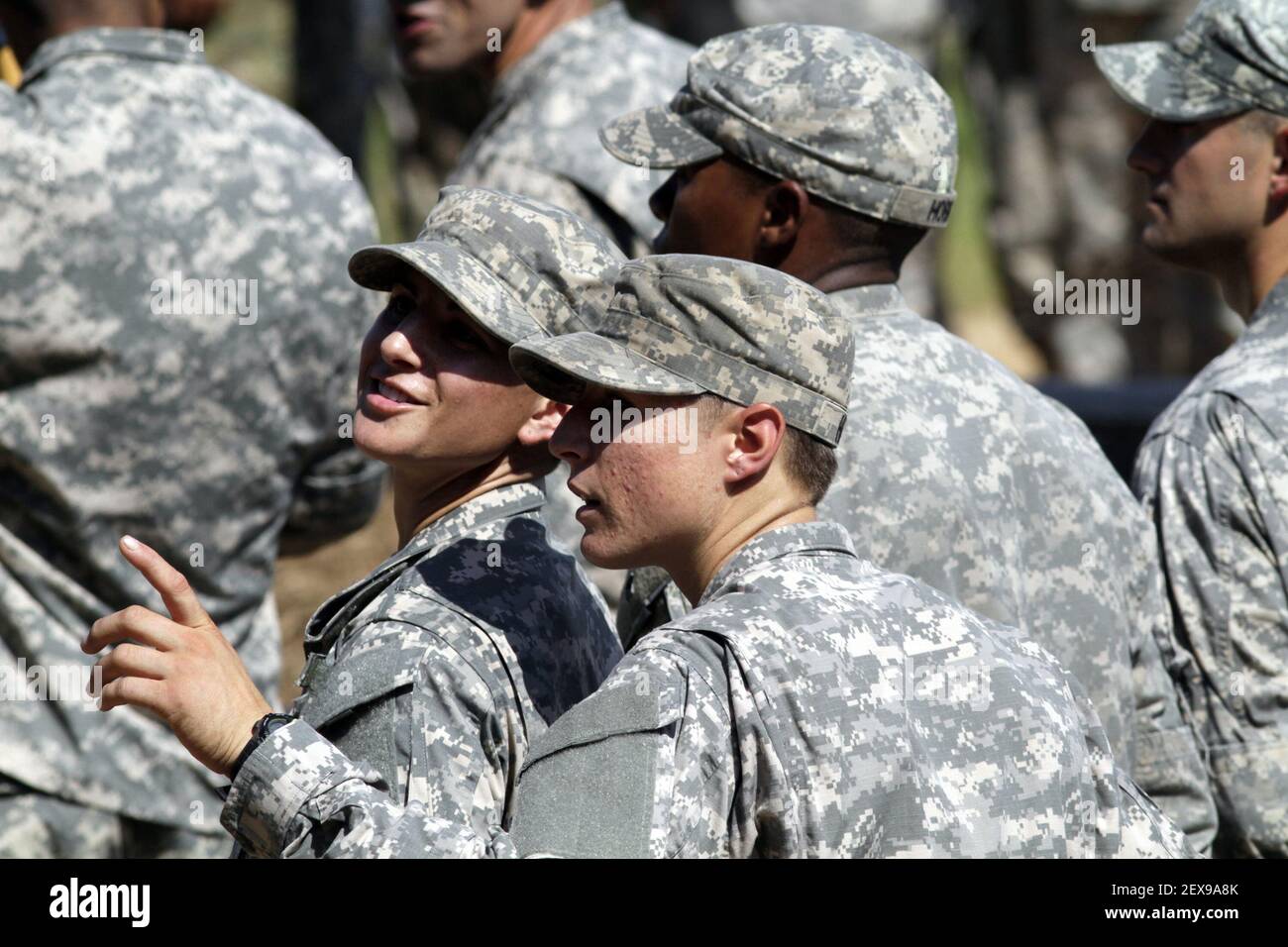 Kristen Griest, left, and 1st Lt. Shayne Haver wait for Ranger School ...