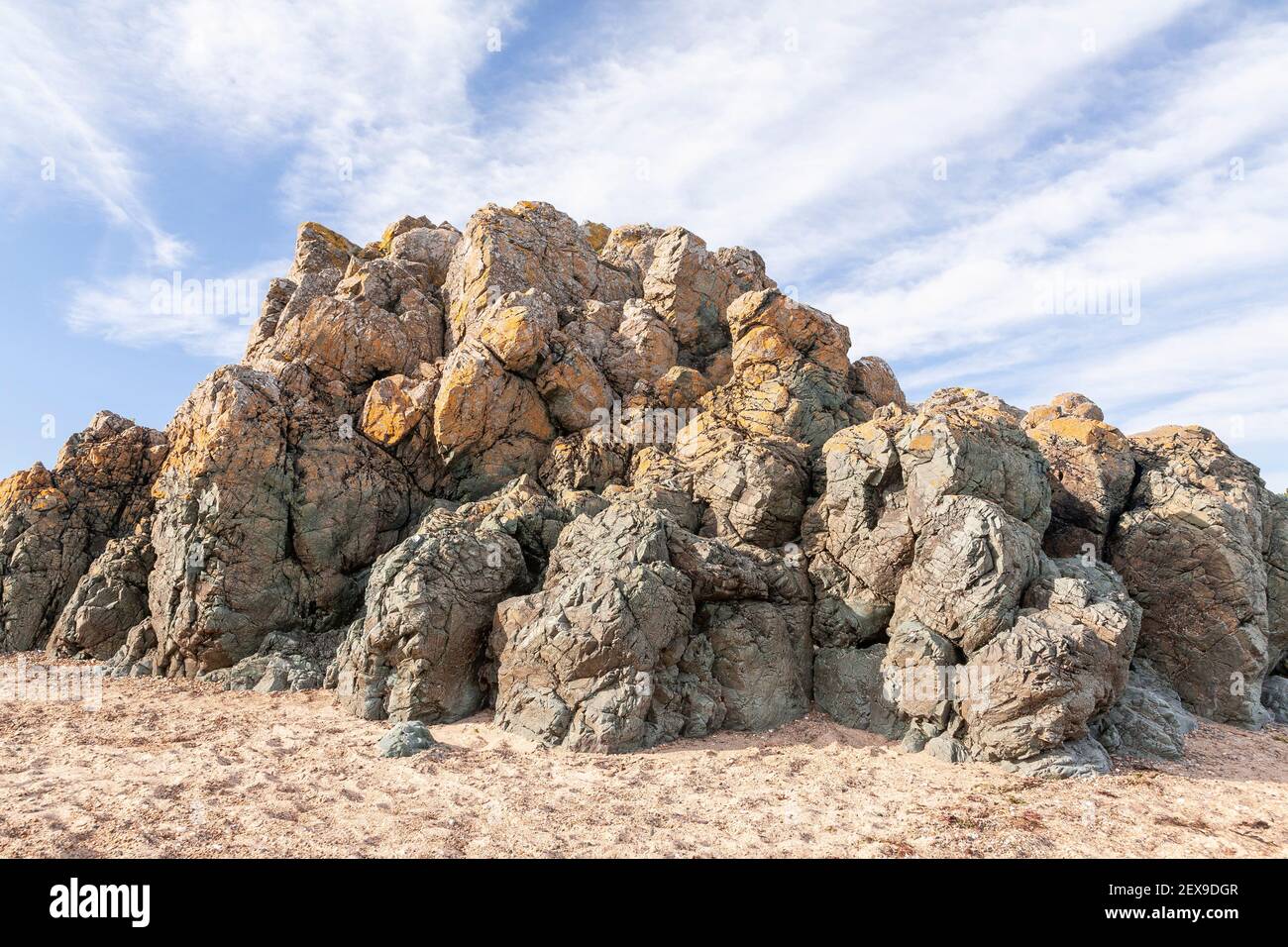 Volcanic rock outcrop at Llanddwyn Island, Newborough Beach, Anglesey ...