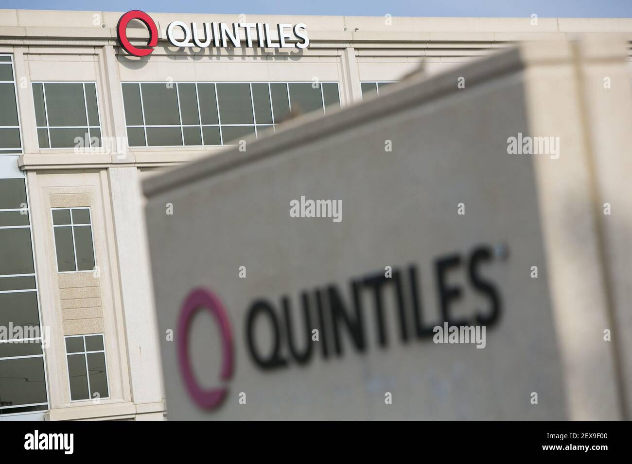 A logo sign outside of a facility occupied by Quintiles Transnational ...