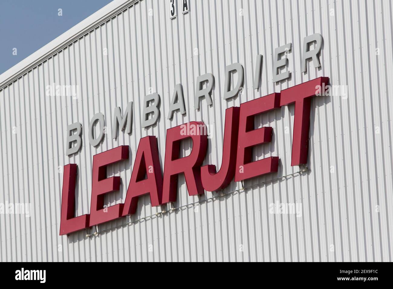 A logo sign outside of the headquarters of the Bombardier Learjet ...