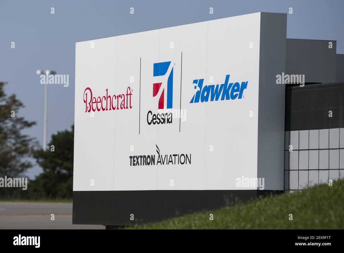 A logo sign outside of the headquarters of the Cessna Aircraft Company ...