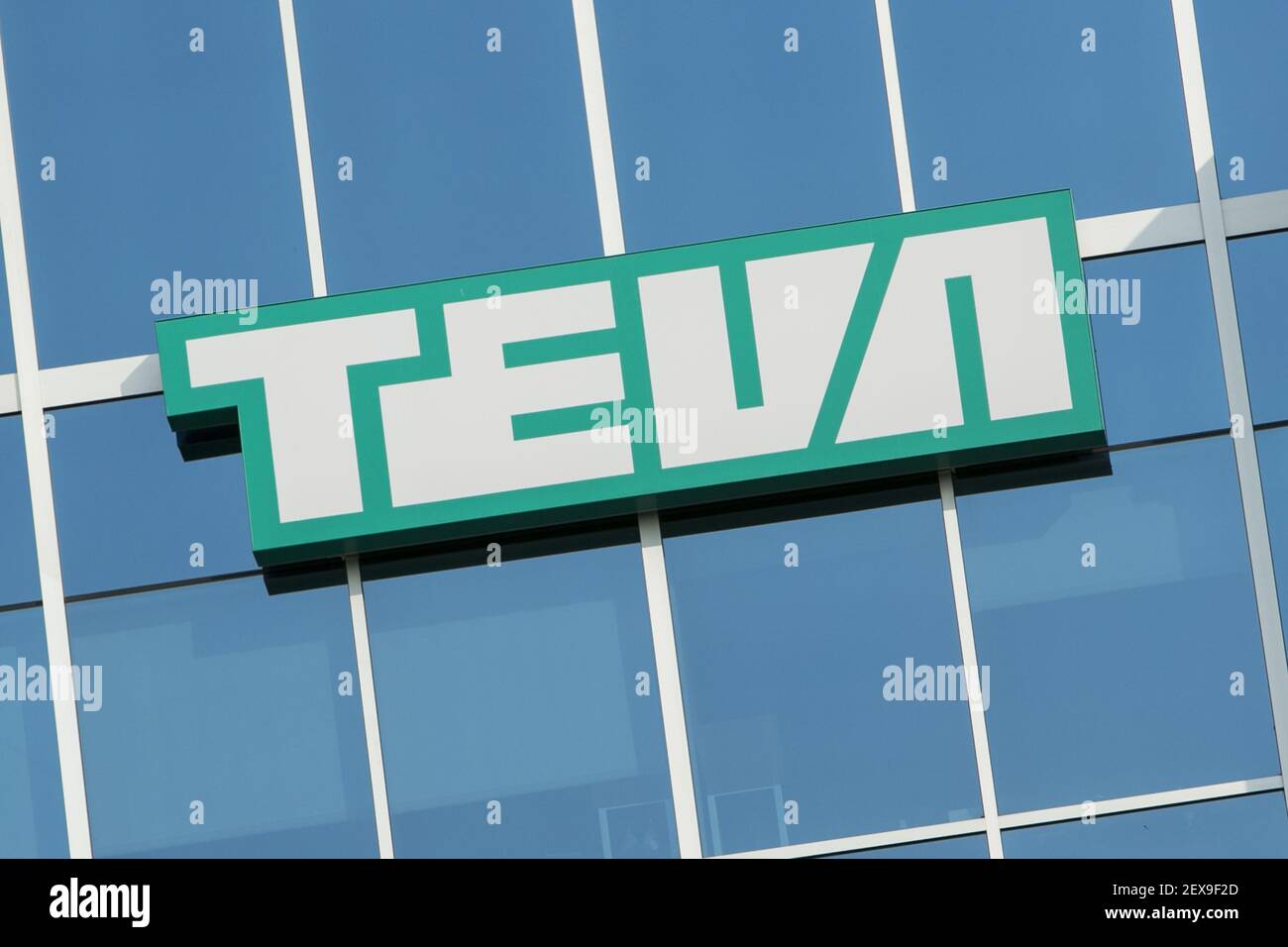 A logo sign outside of a facility occupied by Teva Pharmaceutical Industries in Overland Park ...
