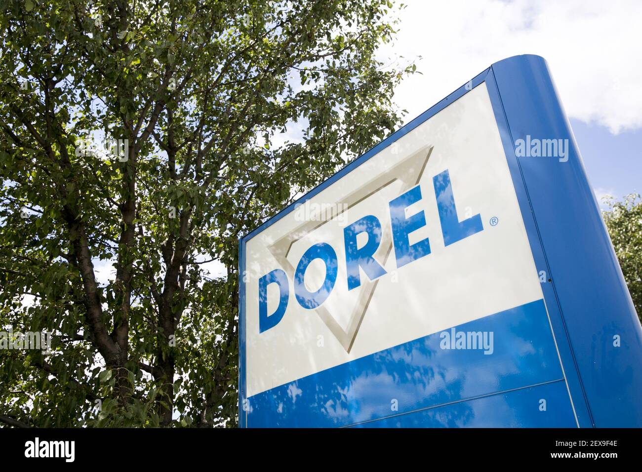 A logo sign outside of a facility occupied by Dorel Industries Inc., in ...