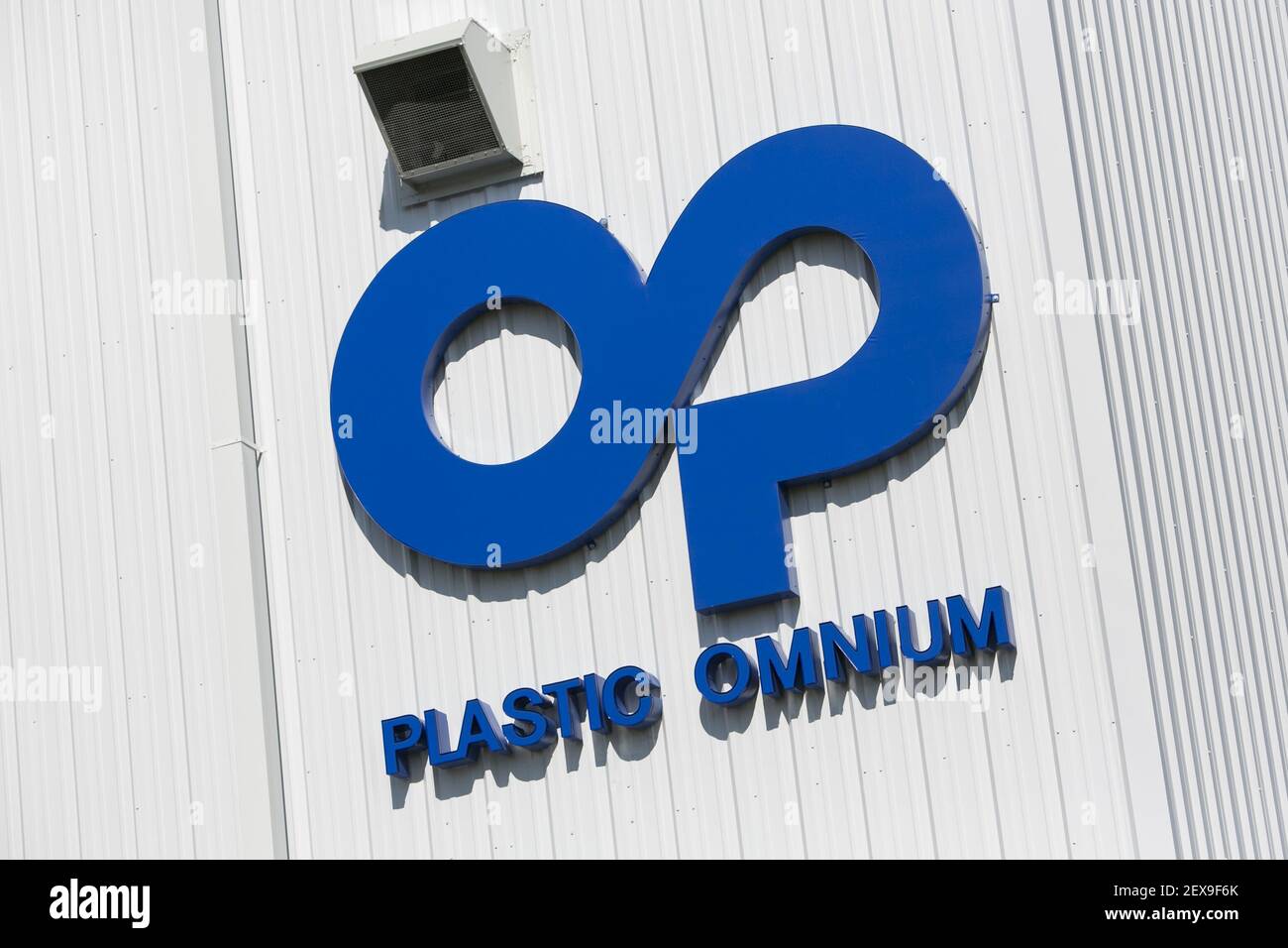 A logo sign outside of a facility occupied by Plastic Omnium in Kansas ...