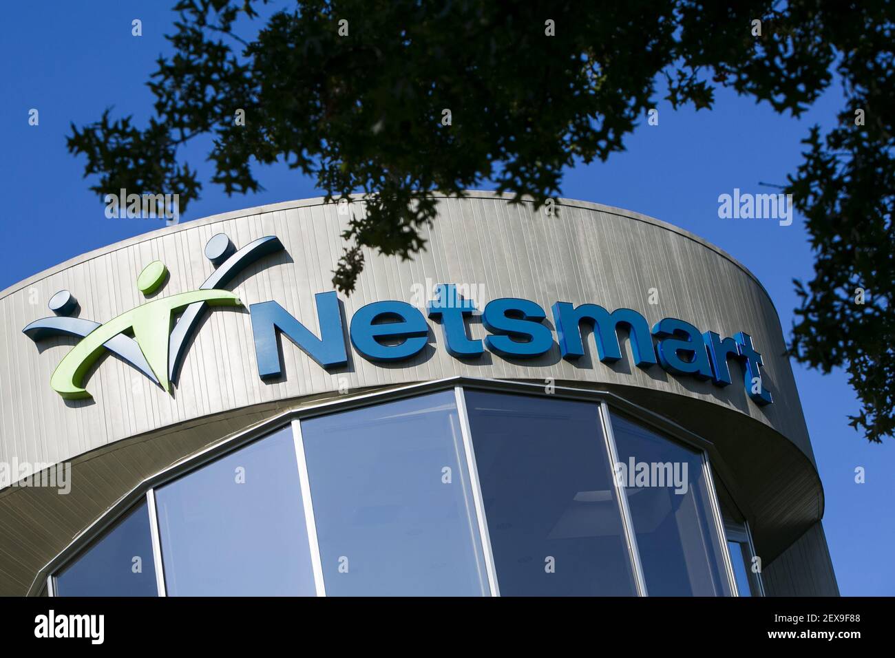 A logo sign outside of the headquarters of Netsmart Technologies in ...