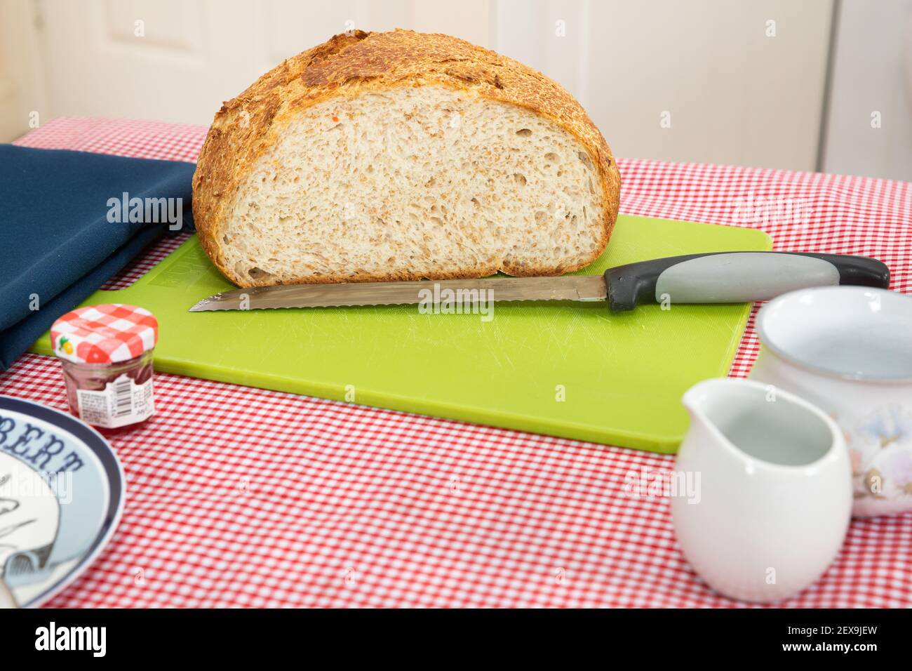 Fresh crusty cob wholemeal loaf cooked in a dutch oven Stock Photo - Alamy