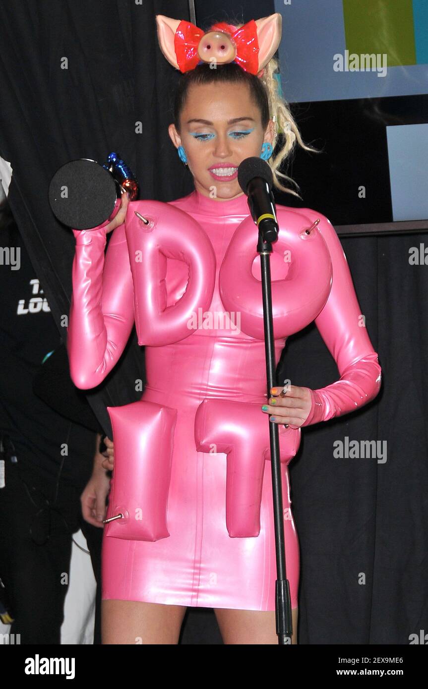 Host Miley Cyrus, styled by Simone Harouche, backstage at the 2015 MTV ...