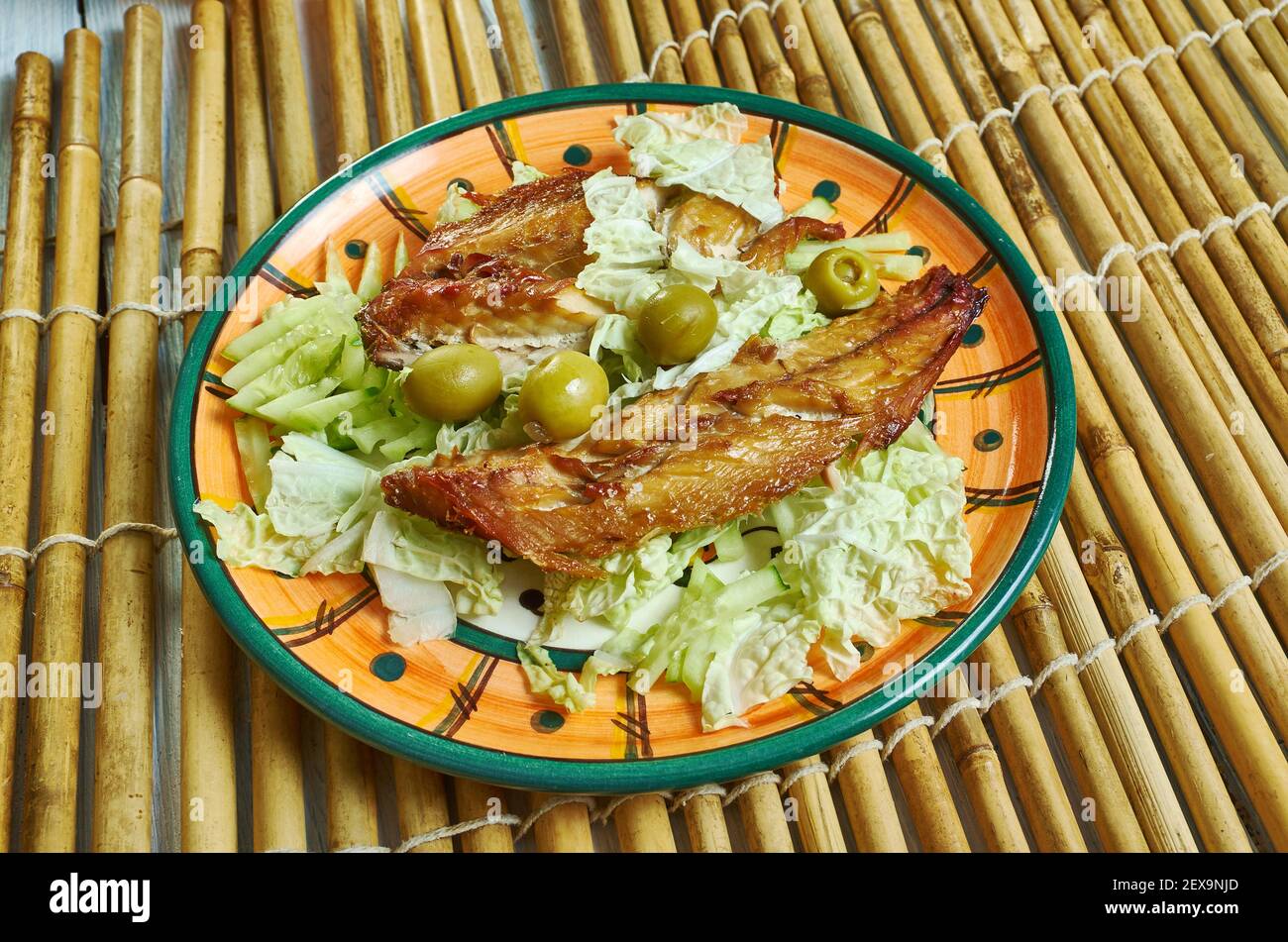 Moroccan-style Grilled mackerel , fish fillets and salad Stock Photo ...