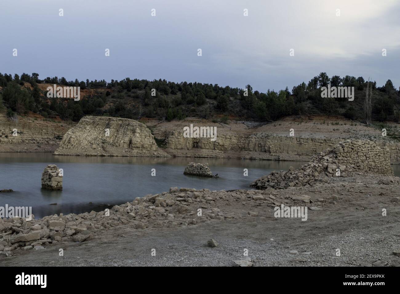 An almost empty reservoir on a gloomy day Stock Photo - Alamy