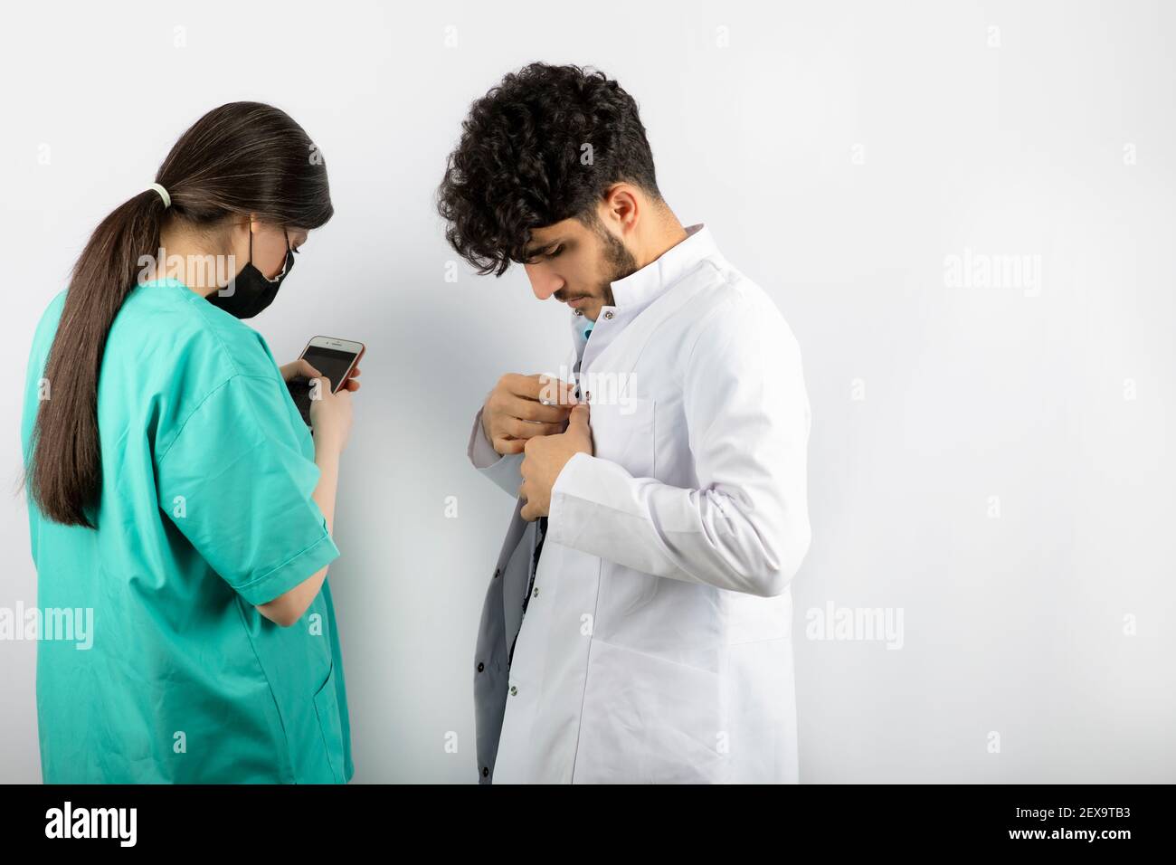 Doctor and his nurse ready to help people' Stock Photo - Alamy