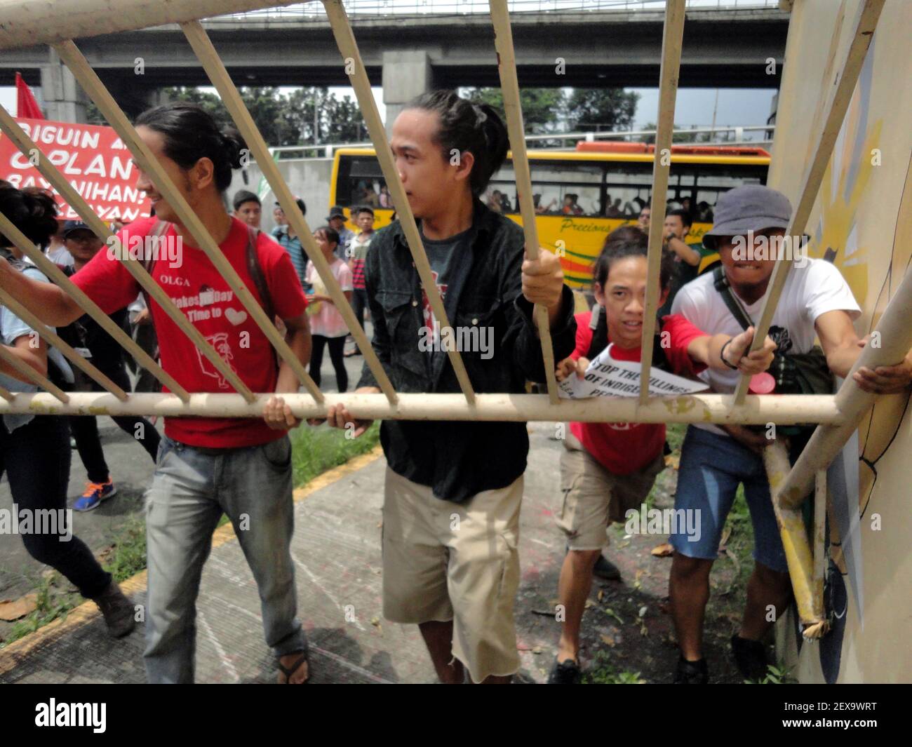 MANILA, PHILIPPINES - SEPTEMBER 4, 2015 - Filipino protesters remove a ...