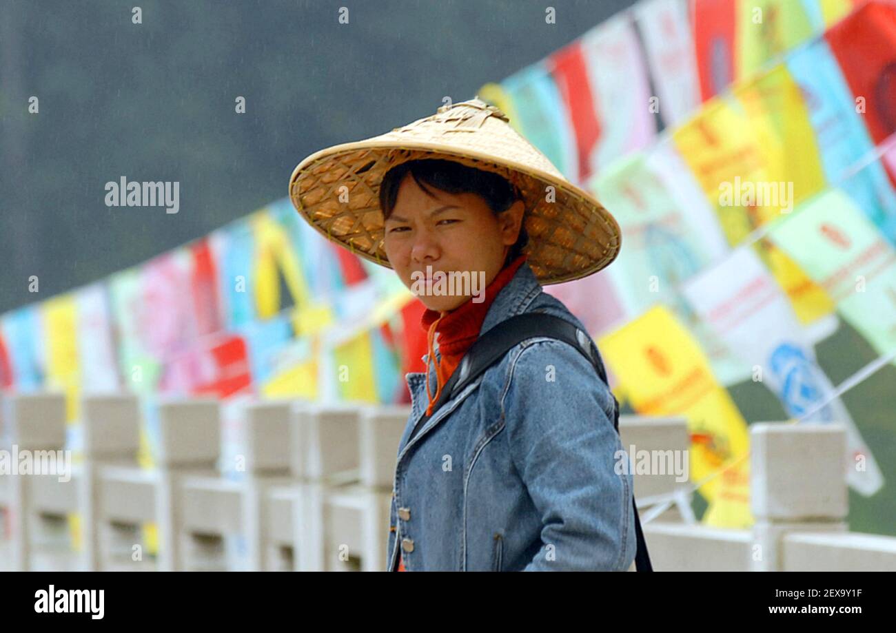 COLOURDFUL FLAGS GREET TOURISTSAT THE STONE FOREST, YUNNAN, CHINA PIC ...