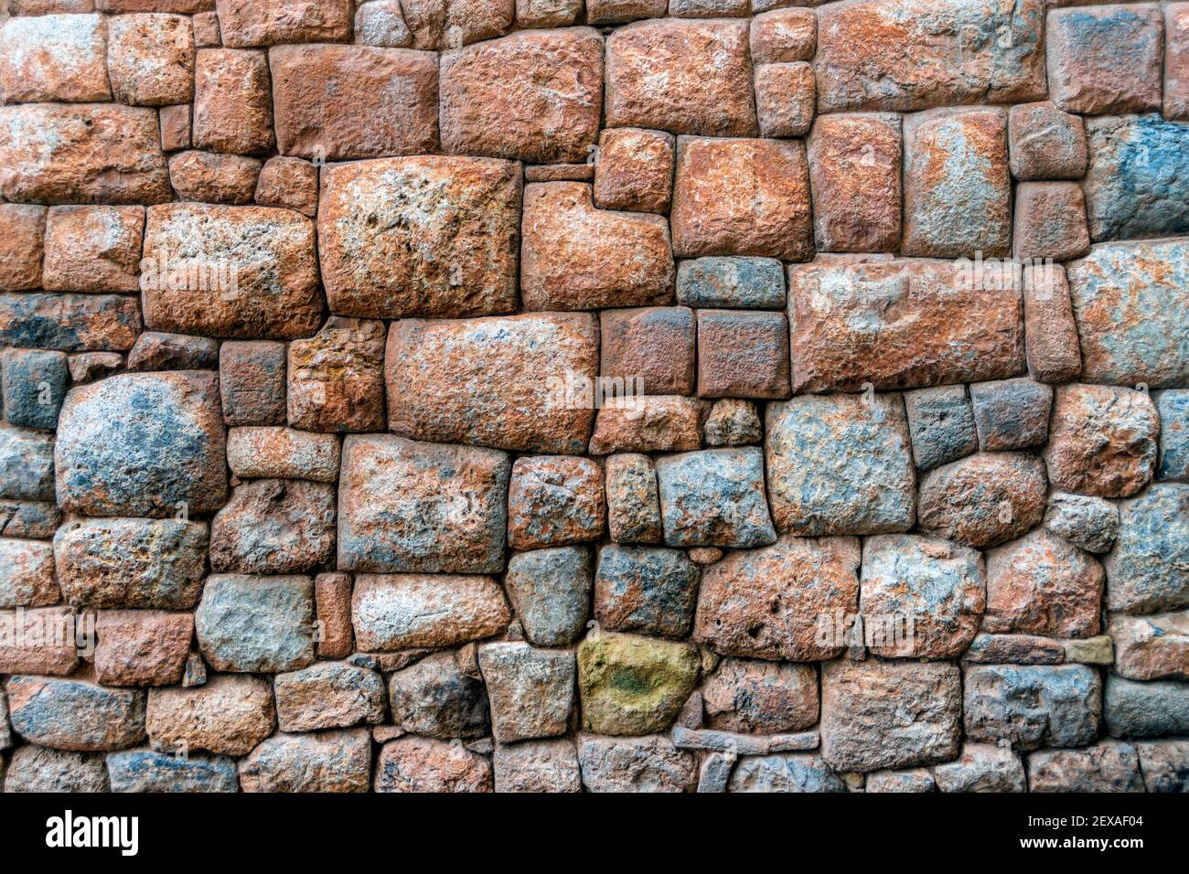 fragment of ancient basement build from various shaped stones in Cusco ...