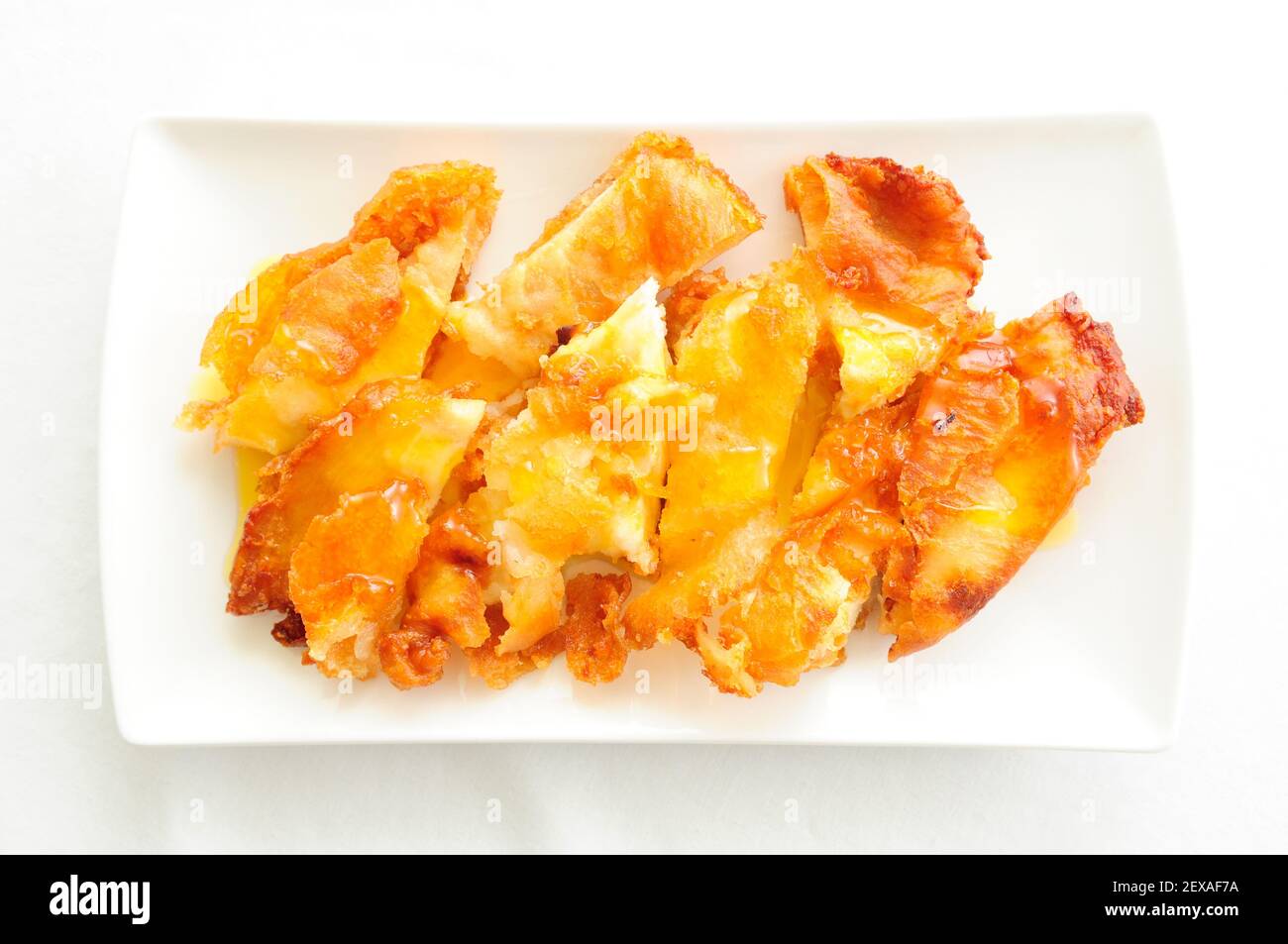 lemon chicken battered and deep fried with lemon sauce Stock Photo - Alamy