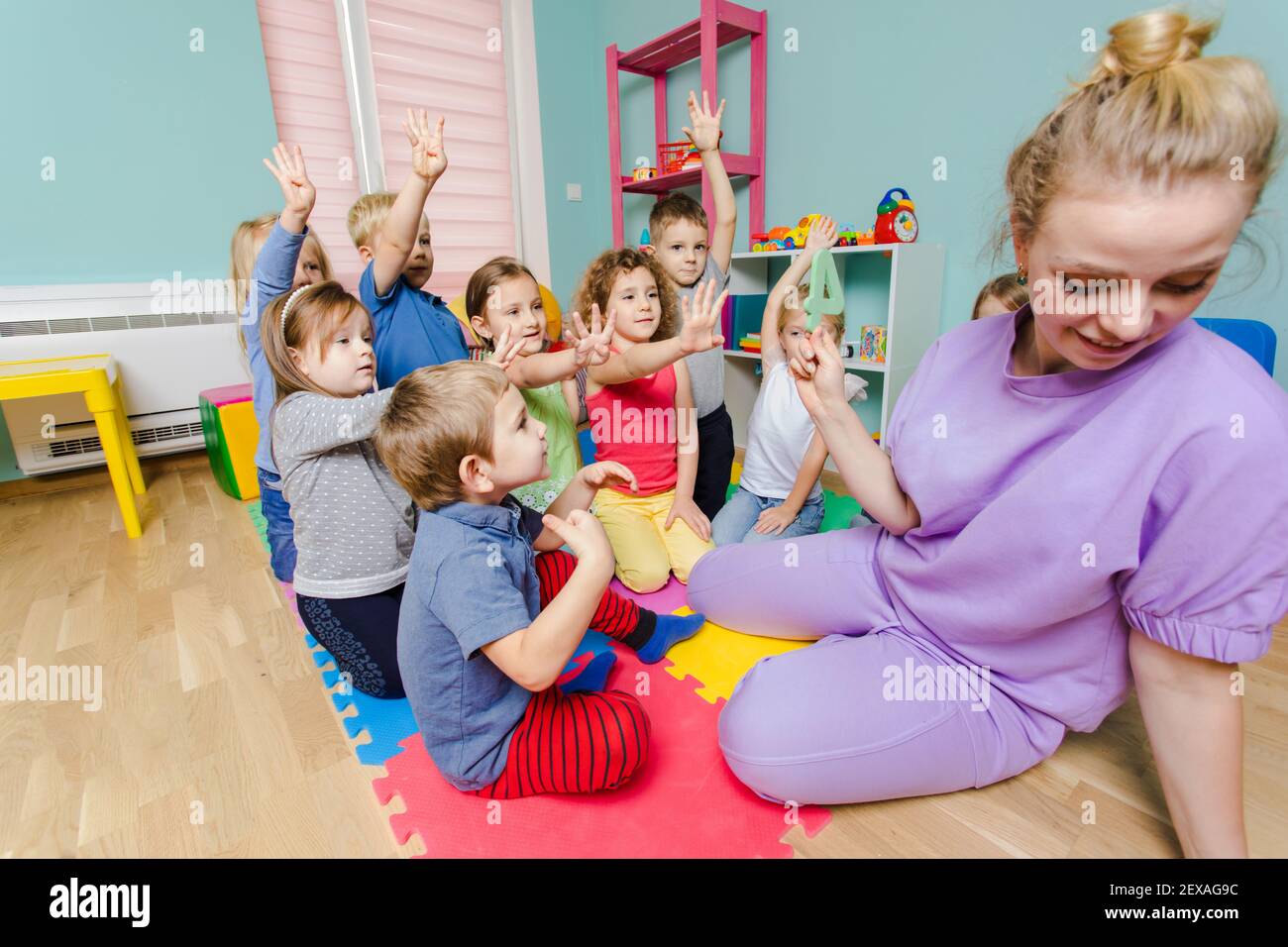 Providing new teaching methods with very young learners Stock Photo - Alamy
