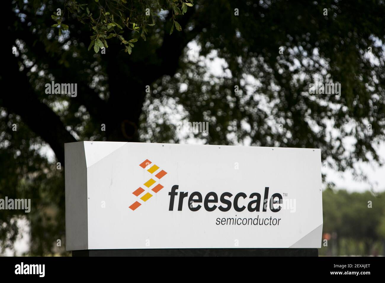 A logo sign outside of the headquarters of Freescale Semiconductor Inc ...
