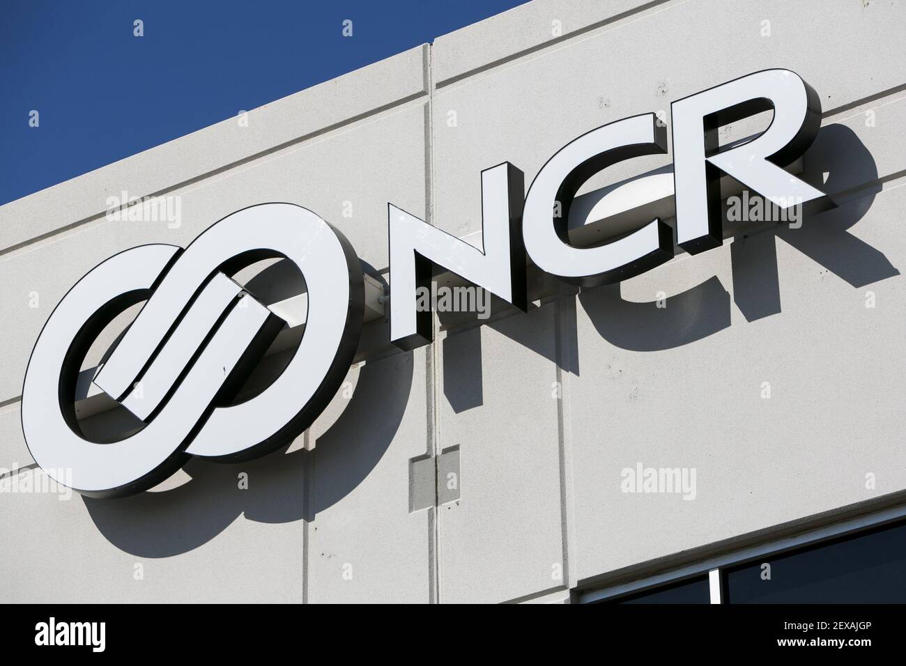 A logo sign outside of a facility occupied by the NCR Corporation in ...