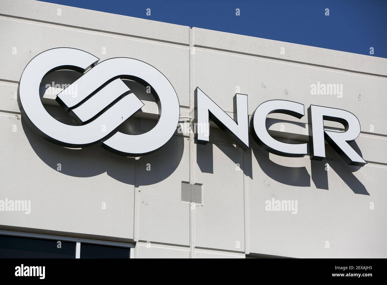 A logo sign outside of a facility occupied by the NCR Corporation in ...