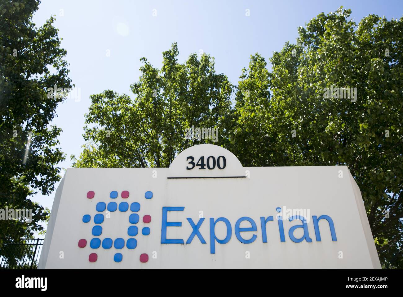 A logo sign outside of a facility occupied by Experian in McKinney ...
