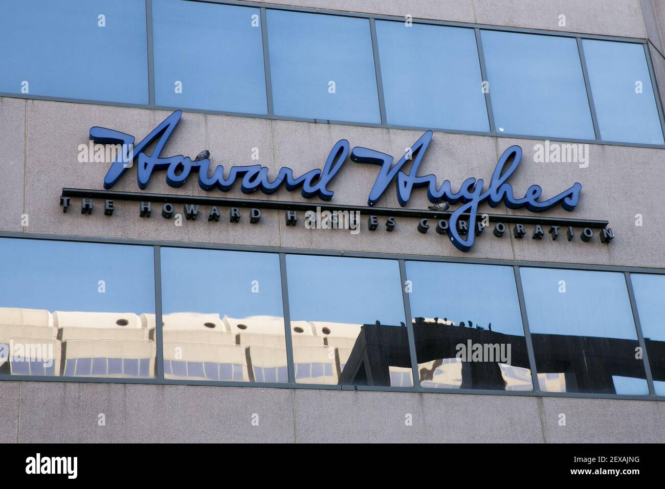 A logo sign outside of the headquarters of The Howard Hughes ...