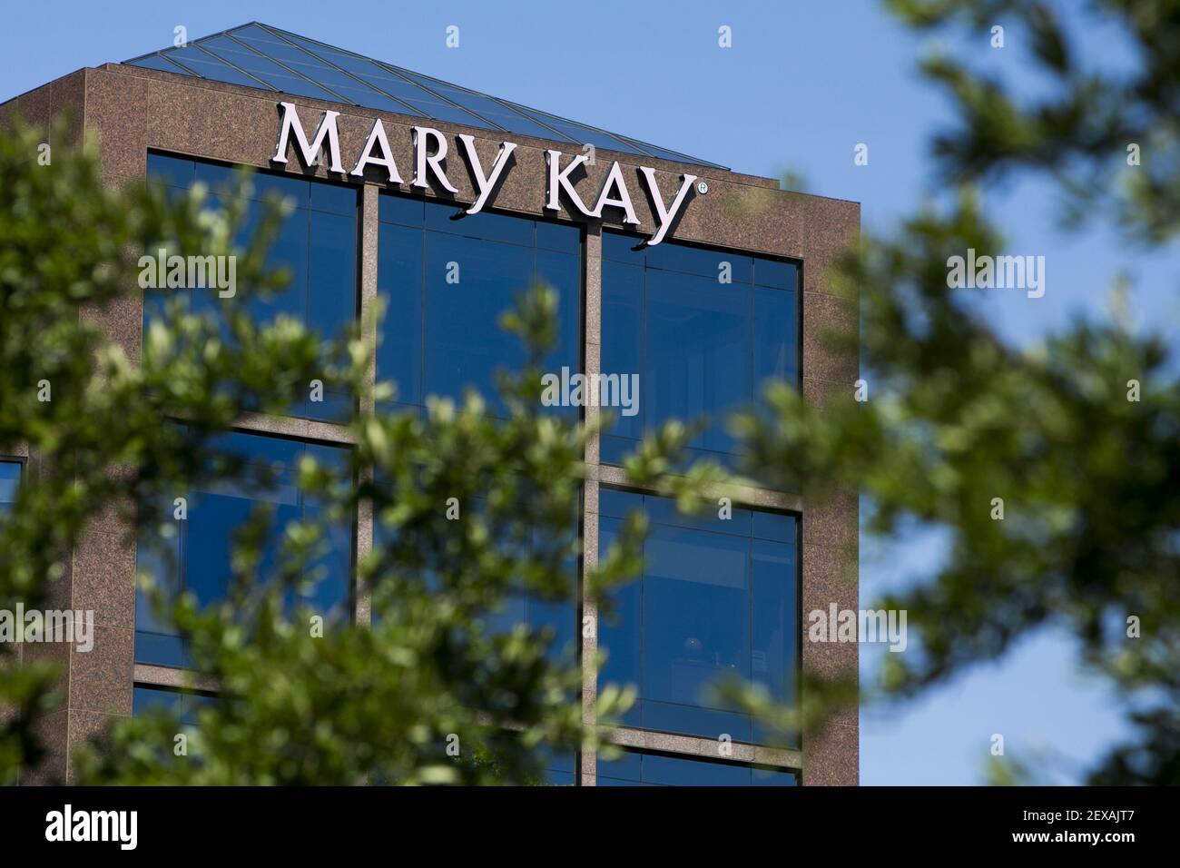 A logo sign outside of the headquarters of Mary Kay, Inc., in Addison ...