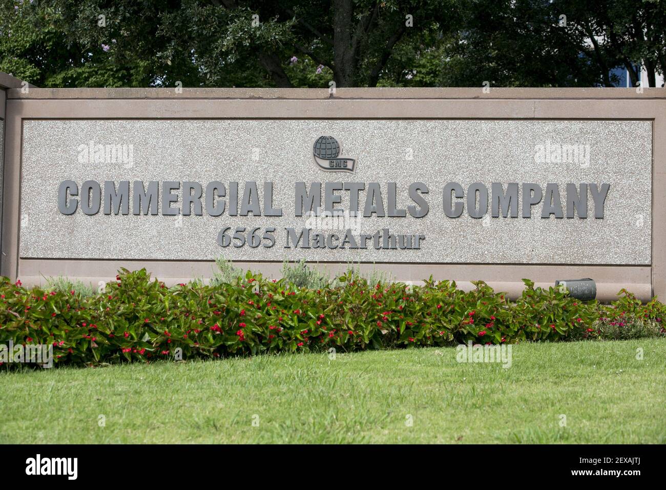A logo sign outside of the headquarters of the Commercial Metals ...