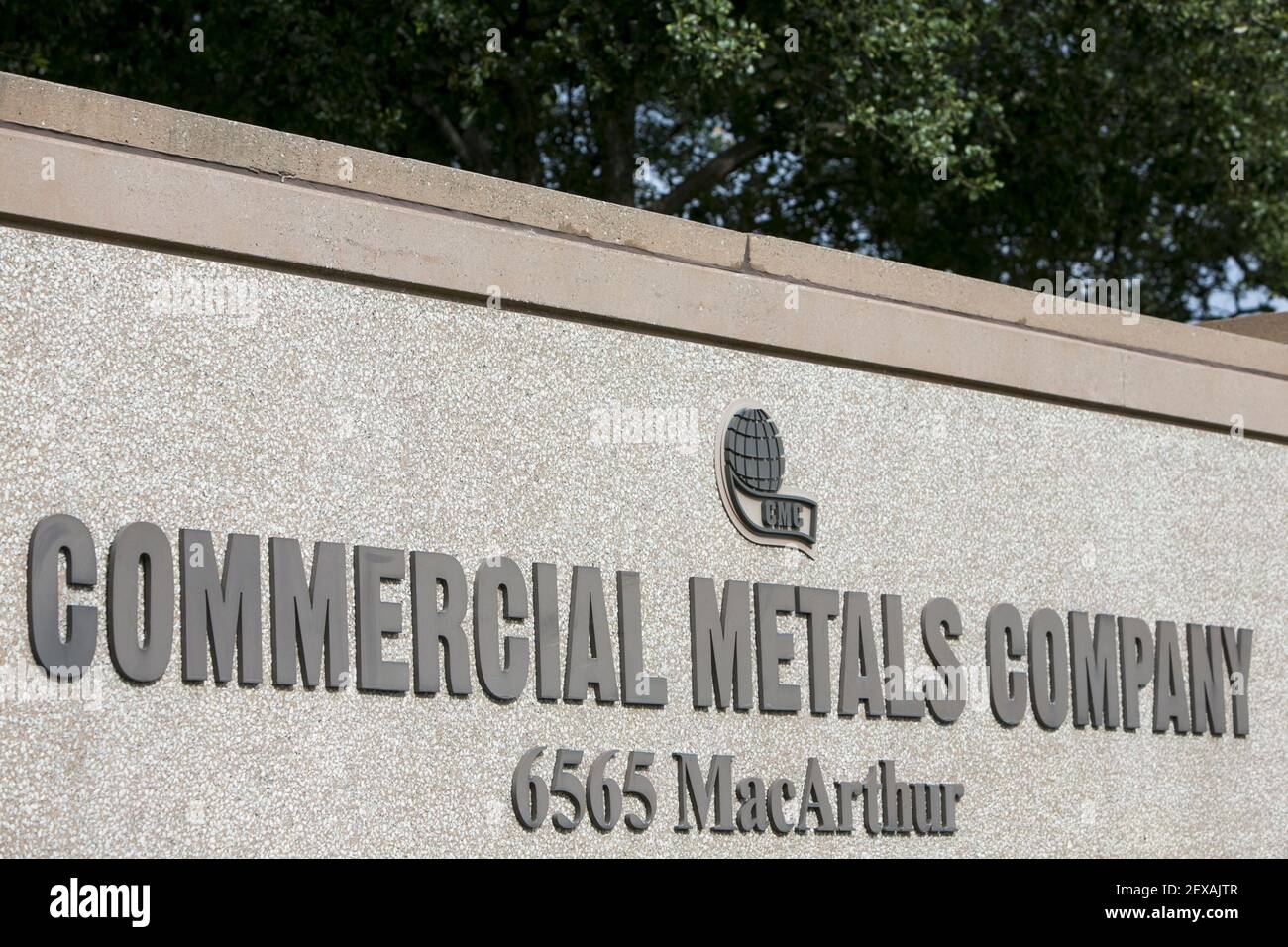 A logo sign outside of the headquarters of the Commercial Metals ...