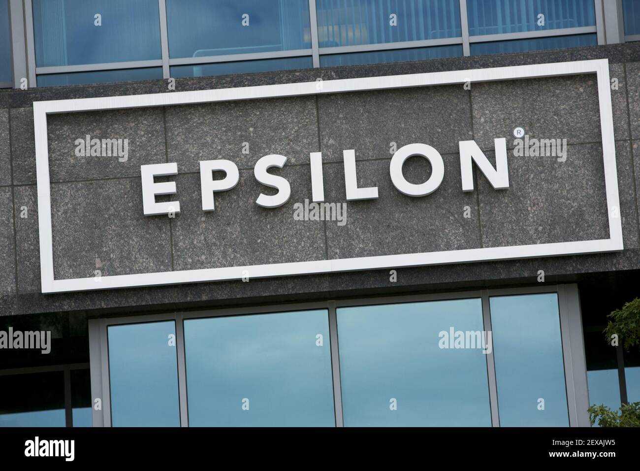 A logo sign outside of a facility occupied by Epsilon in Irving, Texas ...