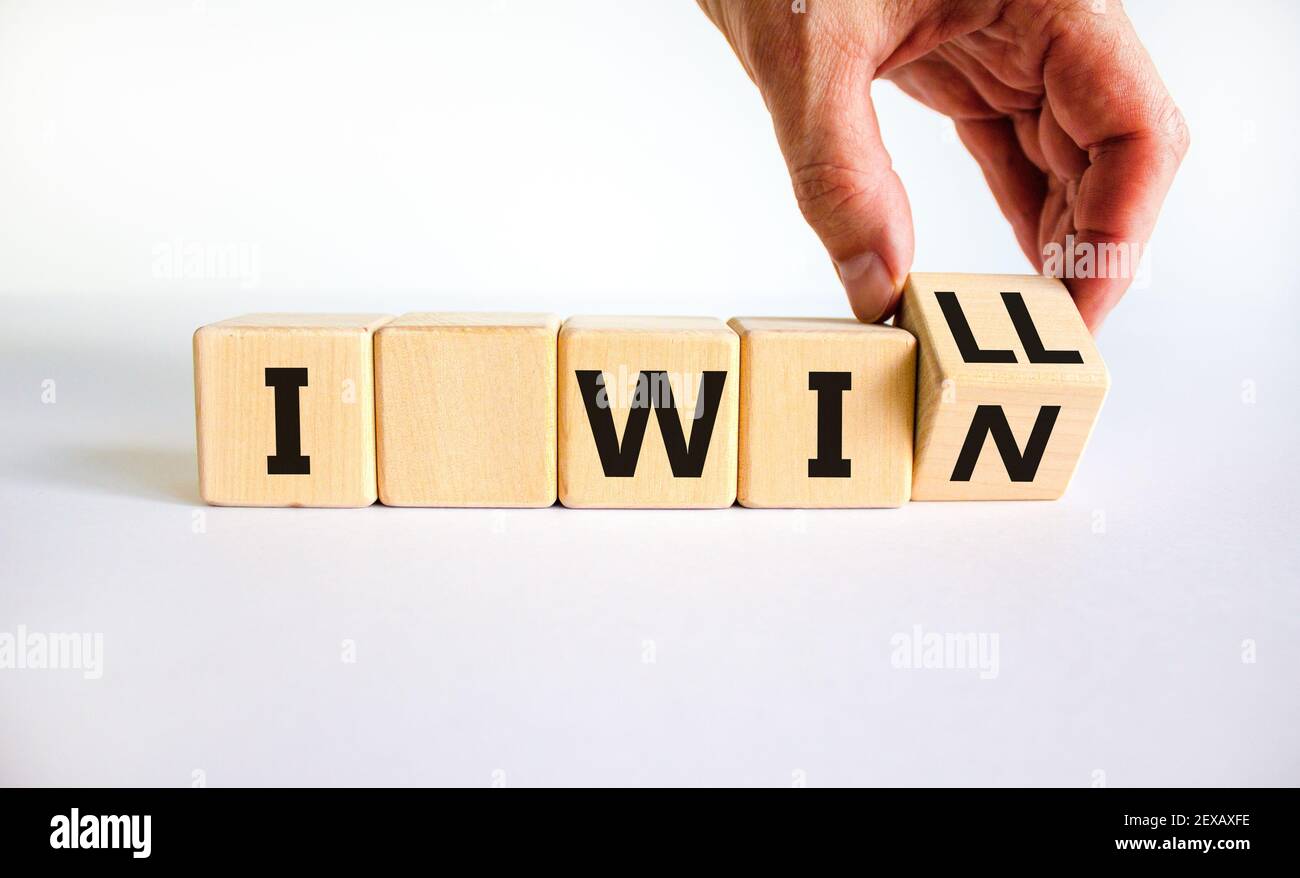 I will win symbol. Businessman turns cubes and changes words i will to ...