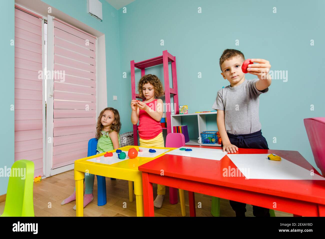 the child enjoys his work at the kindergarten Stock Photo - Alamy