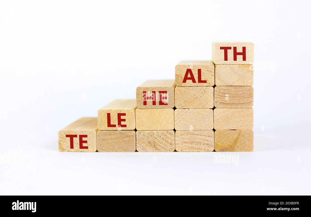 Telehealth symbol. Wooden blocks with word 'Telehealth' stacking as ...
