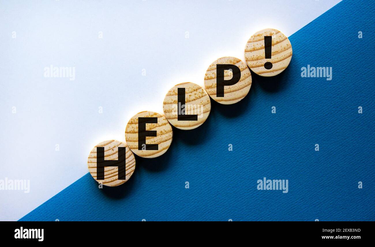 Support and help symbol. Wooden circles with the word 'help'. Business ...