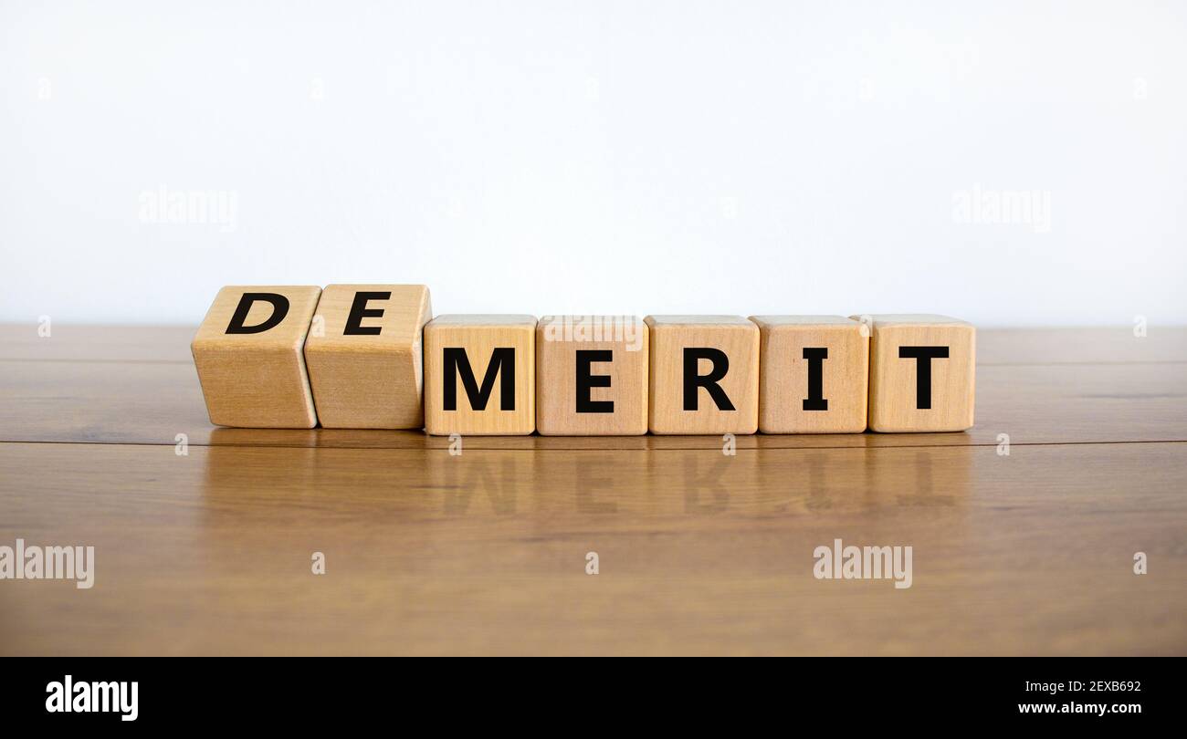 Demerit or merit symbol. Turned wooden cubes and changed words 'demerit ...