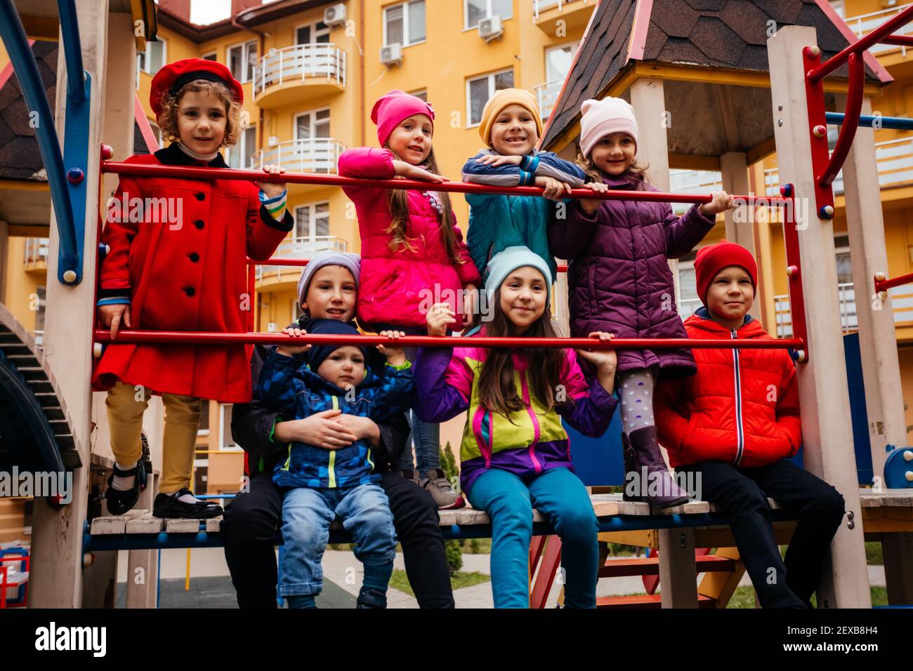 Group of kids walking on the playground Stock Photo - Alamy