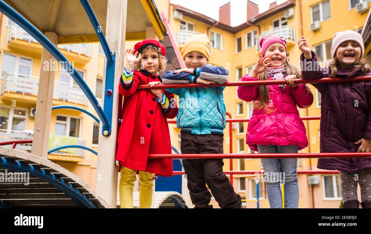 Group of kids walking on the playground Stock Photo - Alamy