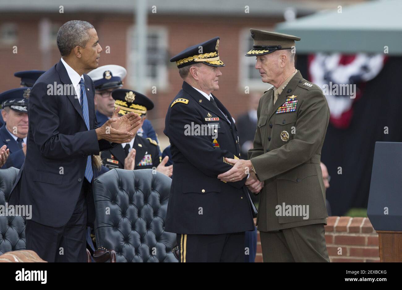 General Martin Dempsey(center) receives congratulations from General ...