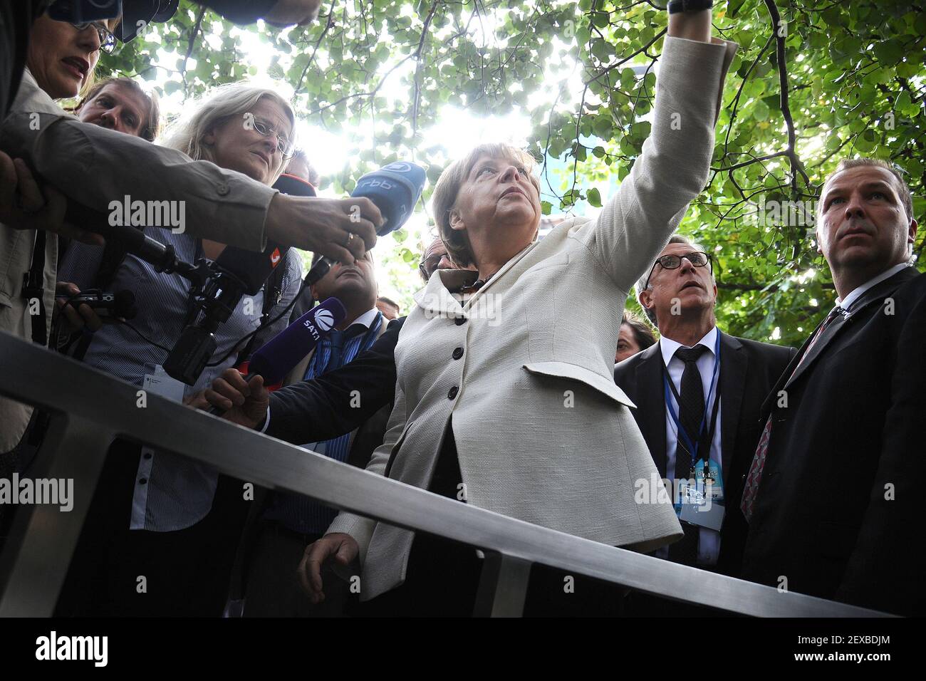 German Chancellor Angela Merkel looks upon the Survivor Tree during her ...